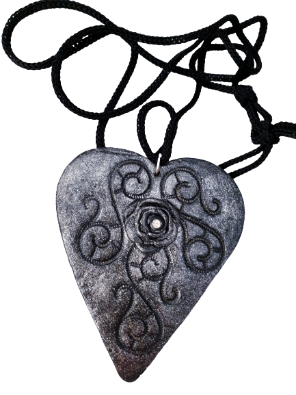 Shop. Polymer clay silver and black heart pendant